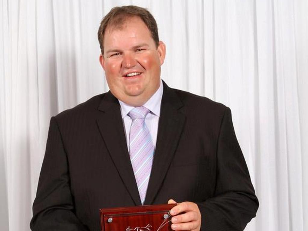 Snudden raises his bat after 100 winners